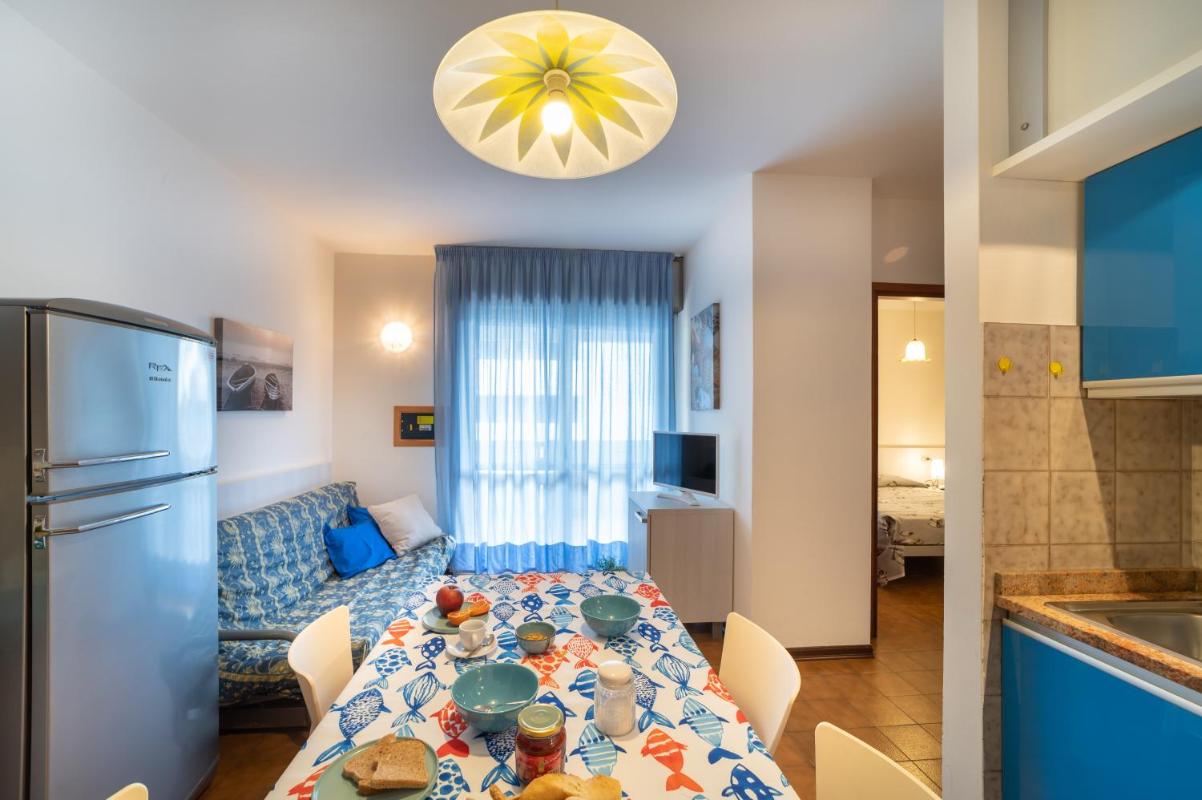 Séjour Confortable Dans Un Appartement Moderne Avec Piscine Extérieure - Bibione